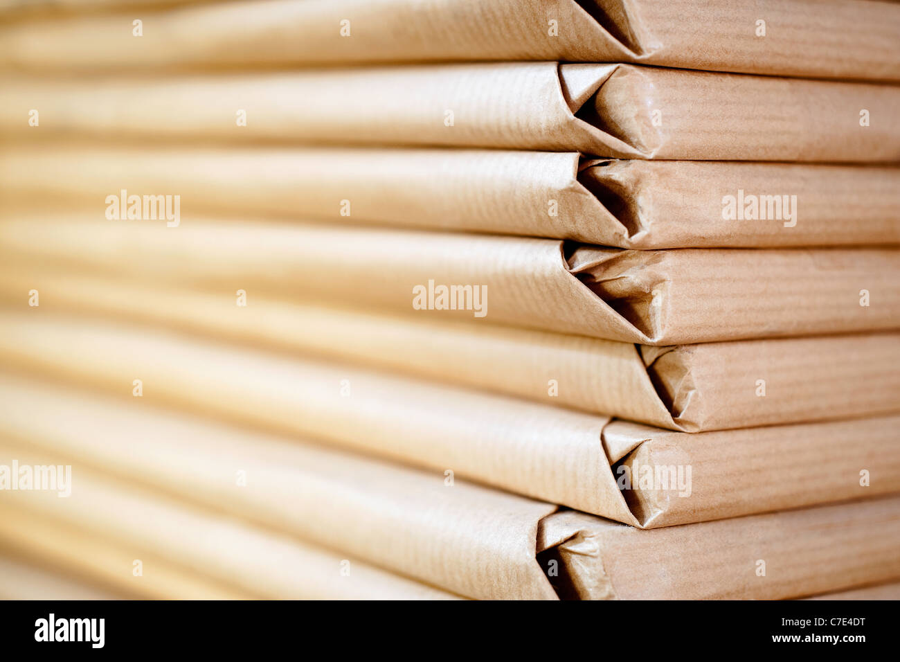 A big pile of printing paper packed in wrapping paper Stock Photo - Alamy