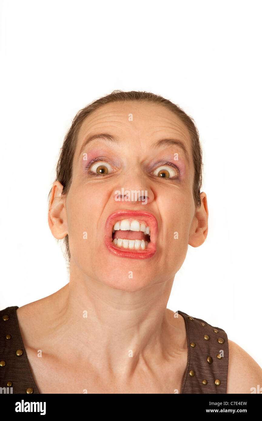 Woman with crazy expression and wide open mouth Stock Photo - Alamy