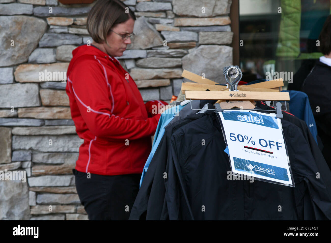 shopper apparel clothes sale sales discount rack Stock Photo - Alamy