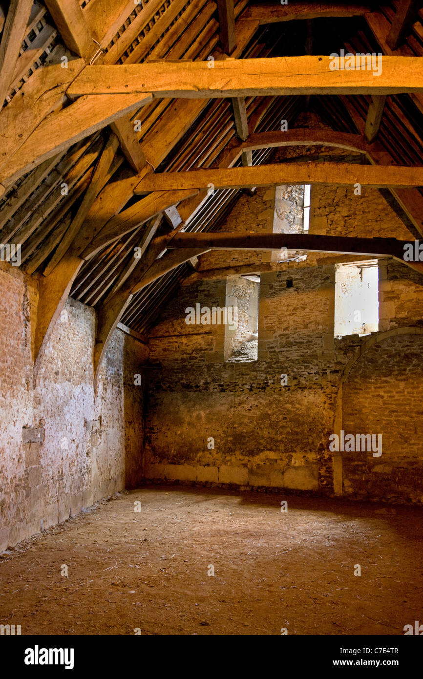 Interior of the tithe barn in East Street Lacock village in Wiltshire ...