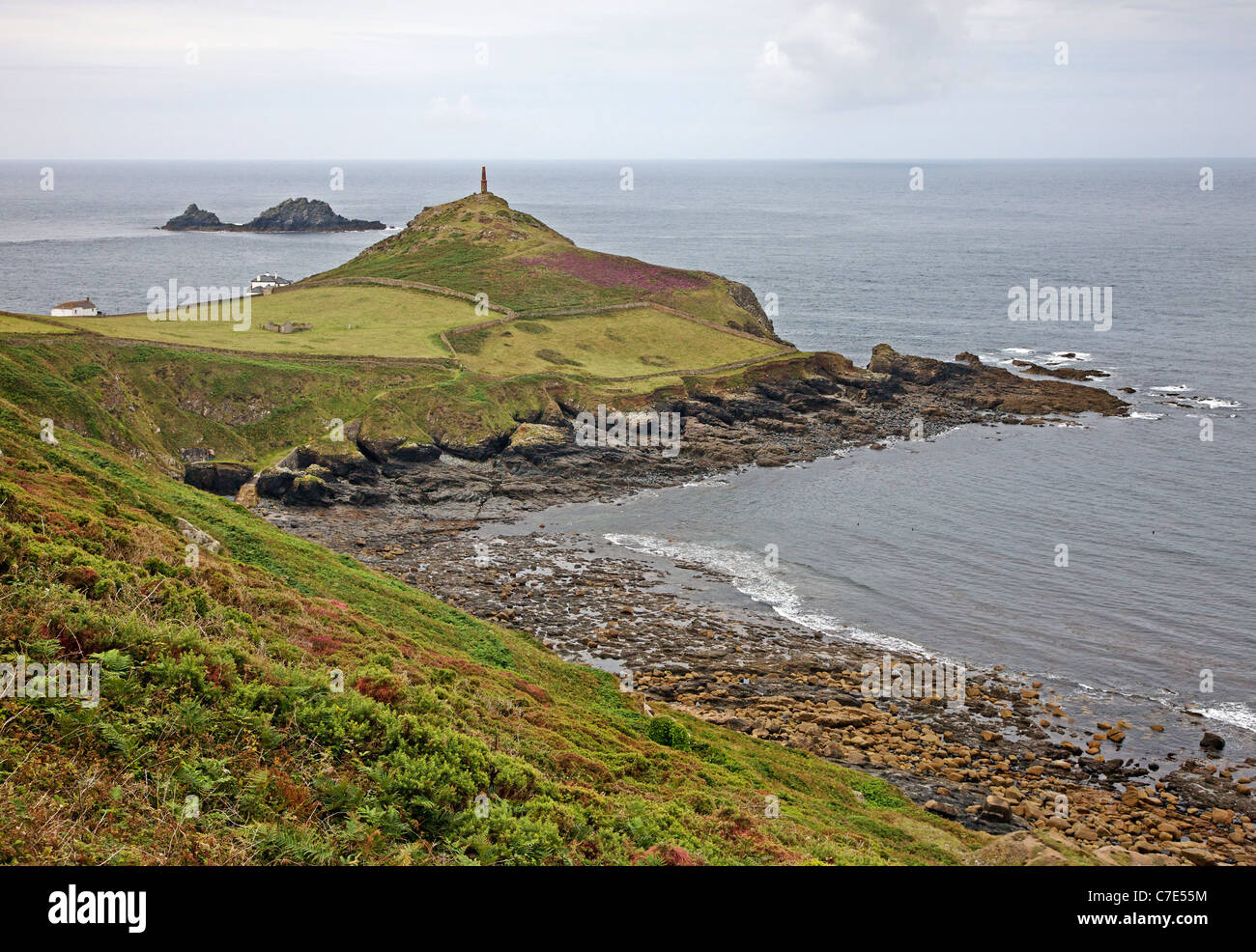 Cape Cornwall topped by its memorial chimney near St Just in Cornwall ...