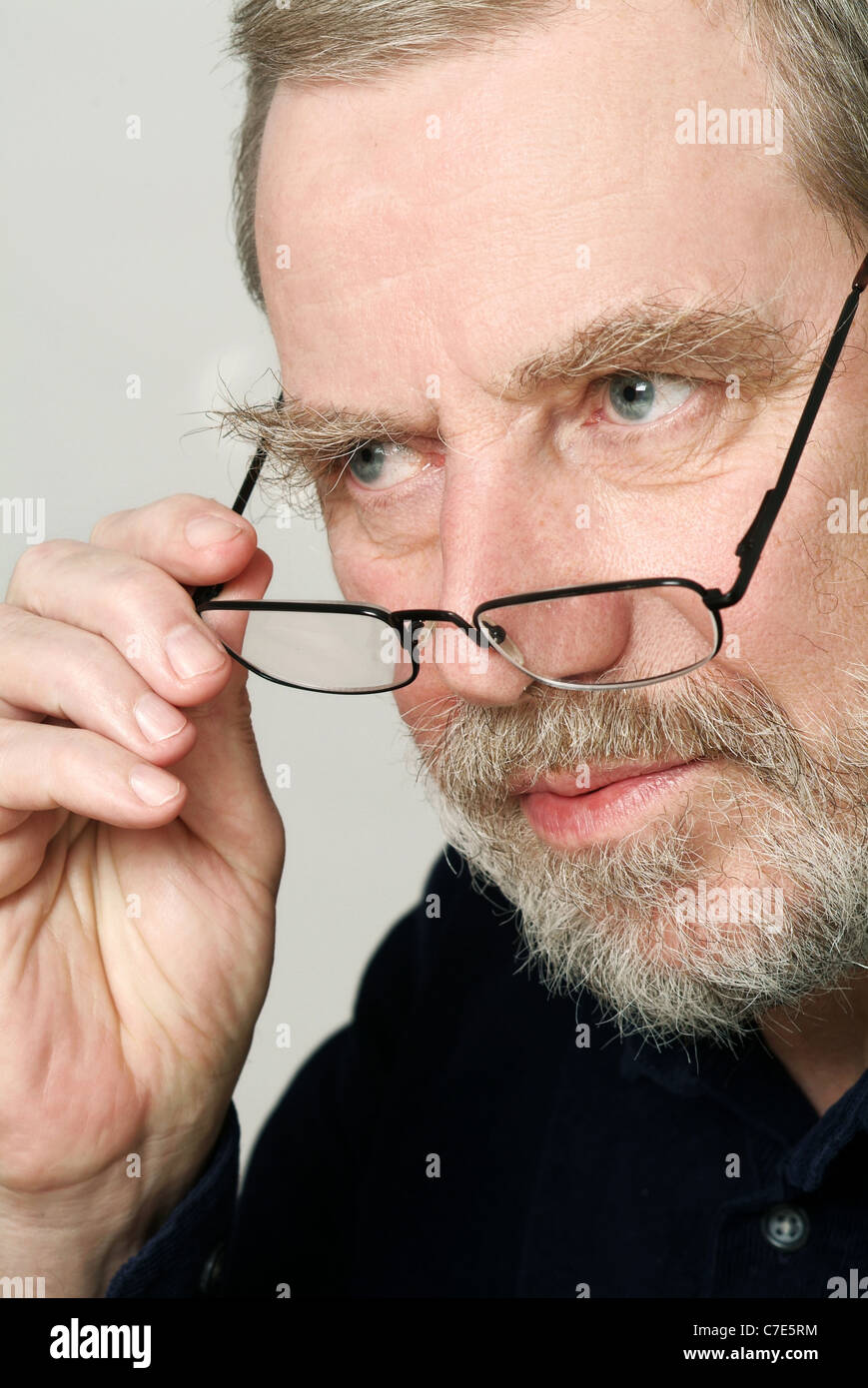 Skeptical man with glasses Stock Photo - Alamy Skeptical man with glasses Stock Photo - Alamy