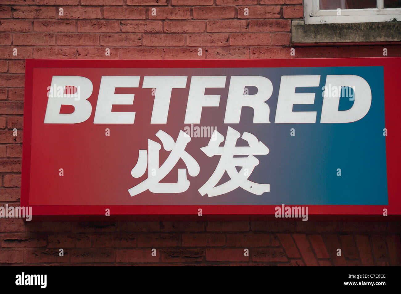 The Betfred logo and sign above the betting shop in Chinatown ...