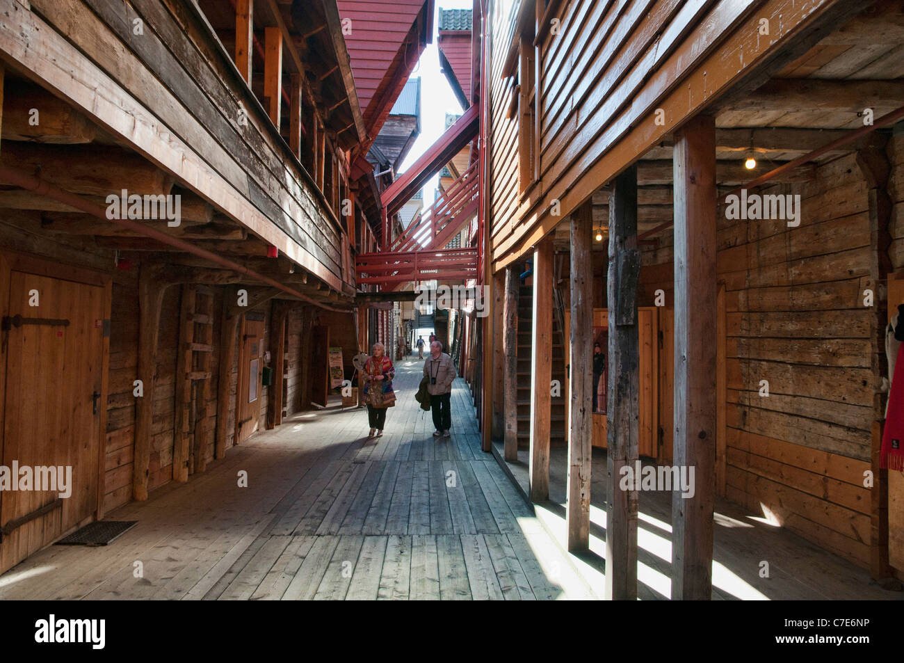 The narrow alleys of Bryggen, the fishermen old district of Bergen ...