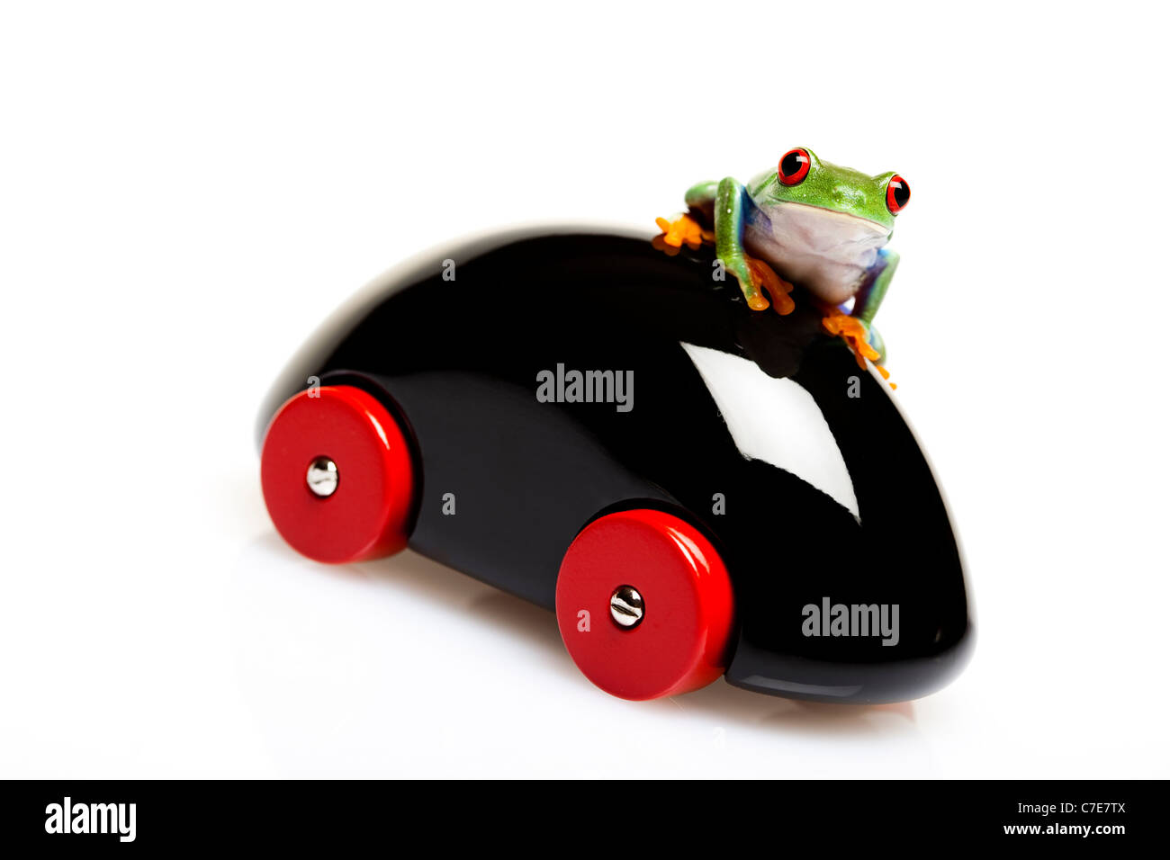 Car toy and crazy frog Stock Photo - Alamy