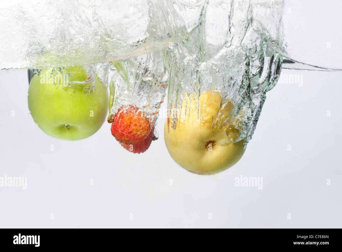 Fruit Splashing in Water Stock Photo - Alamy