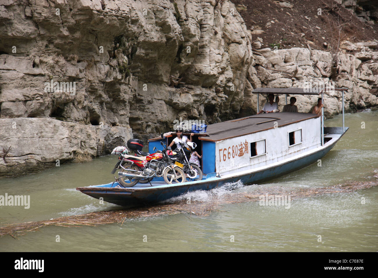 Sampan and motor cycles, MIsty Gorge, Lesser Three Gorges, China Stock ...