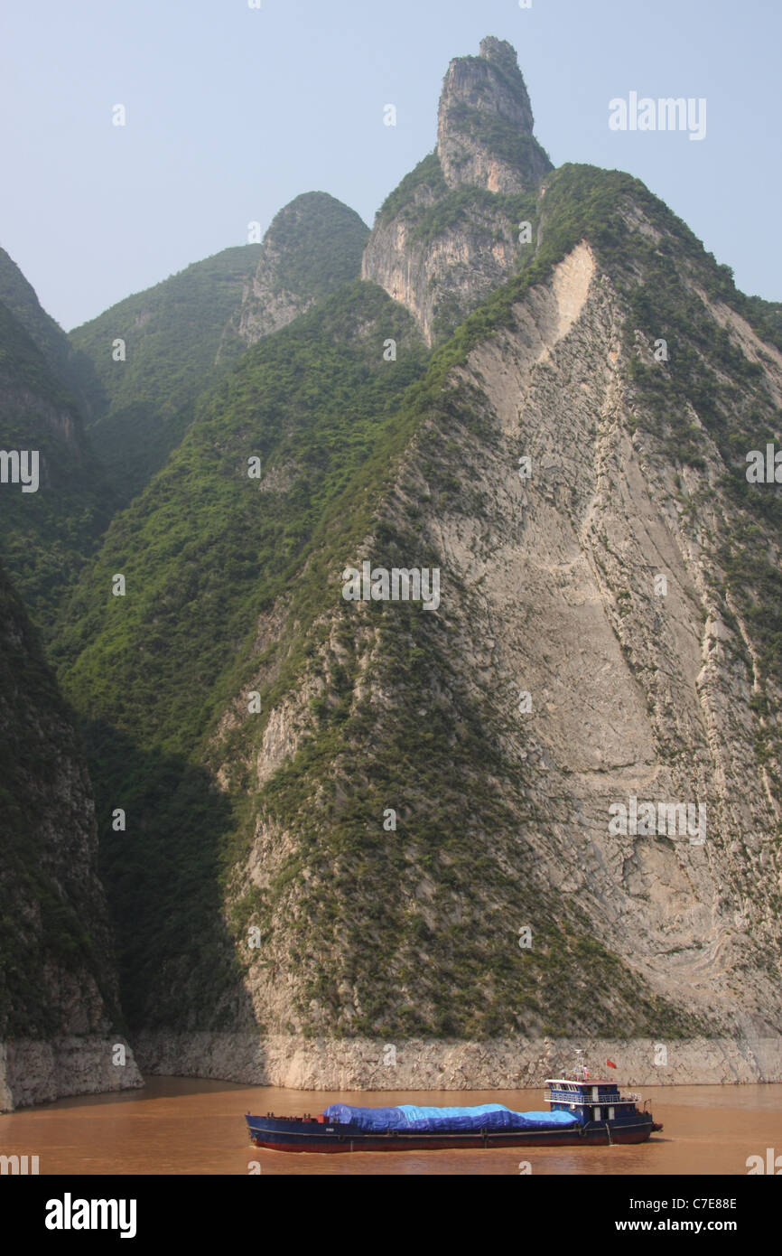 A small river freighter passing through scenic Wu Gorge, Yangtze River ...