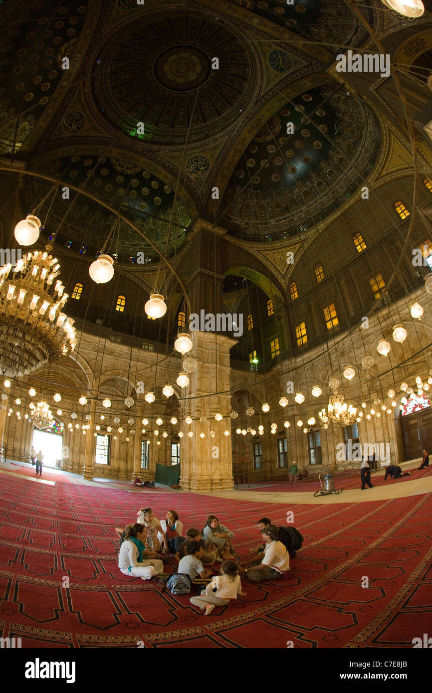 Tour group inside the mosque of Muhammad Ali, Cairo, Egypt Stock Photo ...