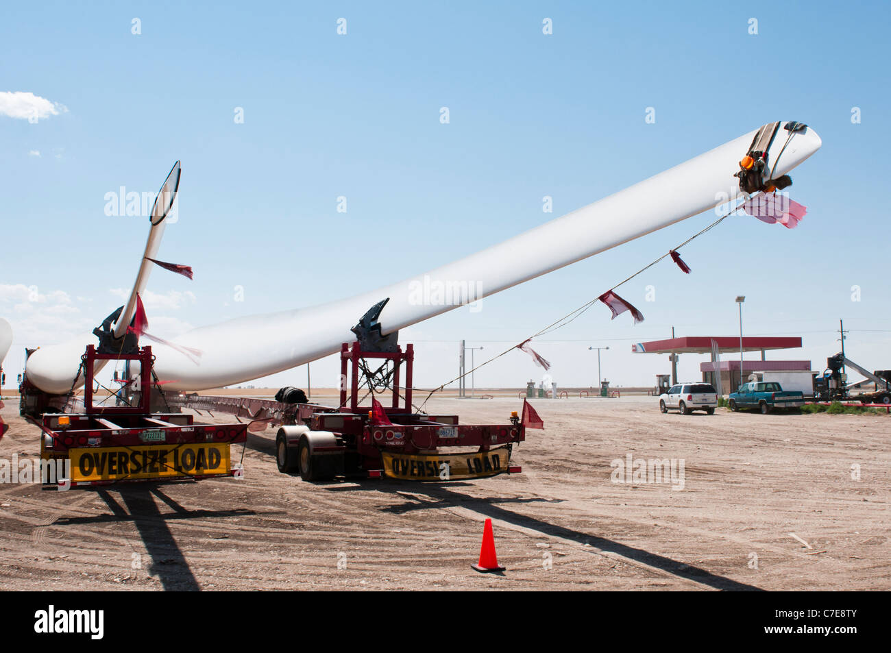 Rotor blades for new wind turbines are transported by trucks and ...