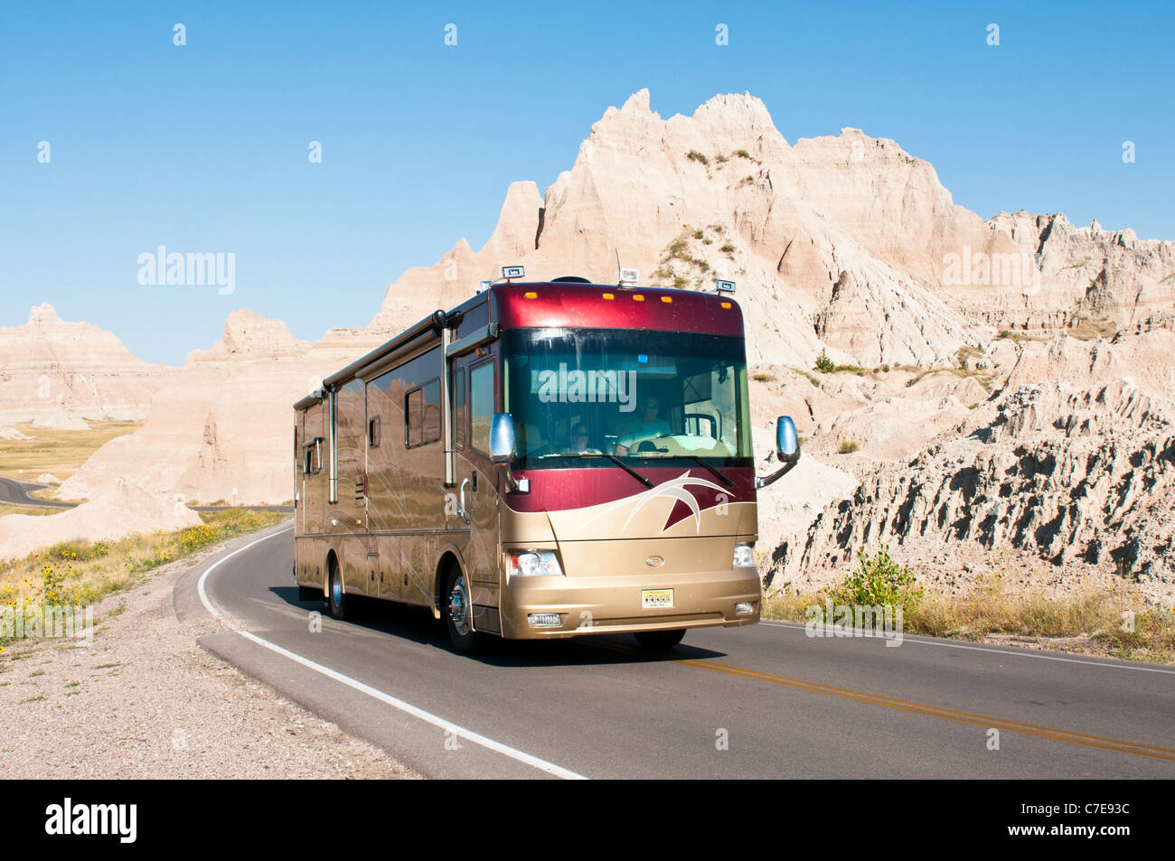 Tourists drive through Badlands National Park in South Dakota Stock ...