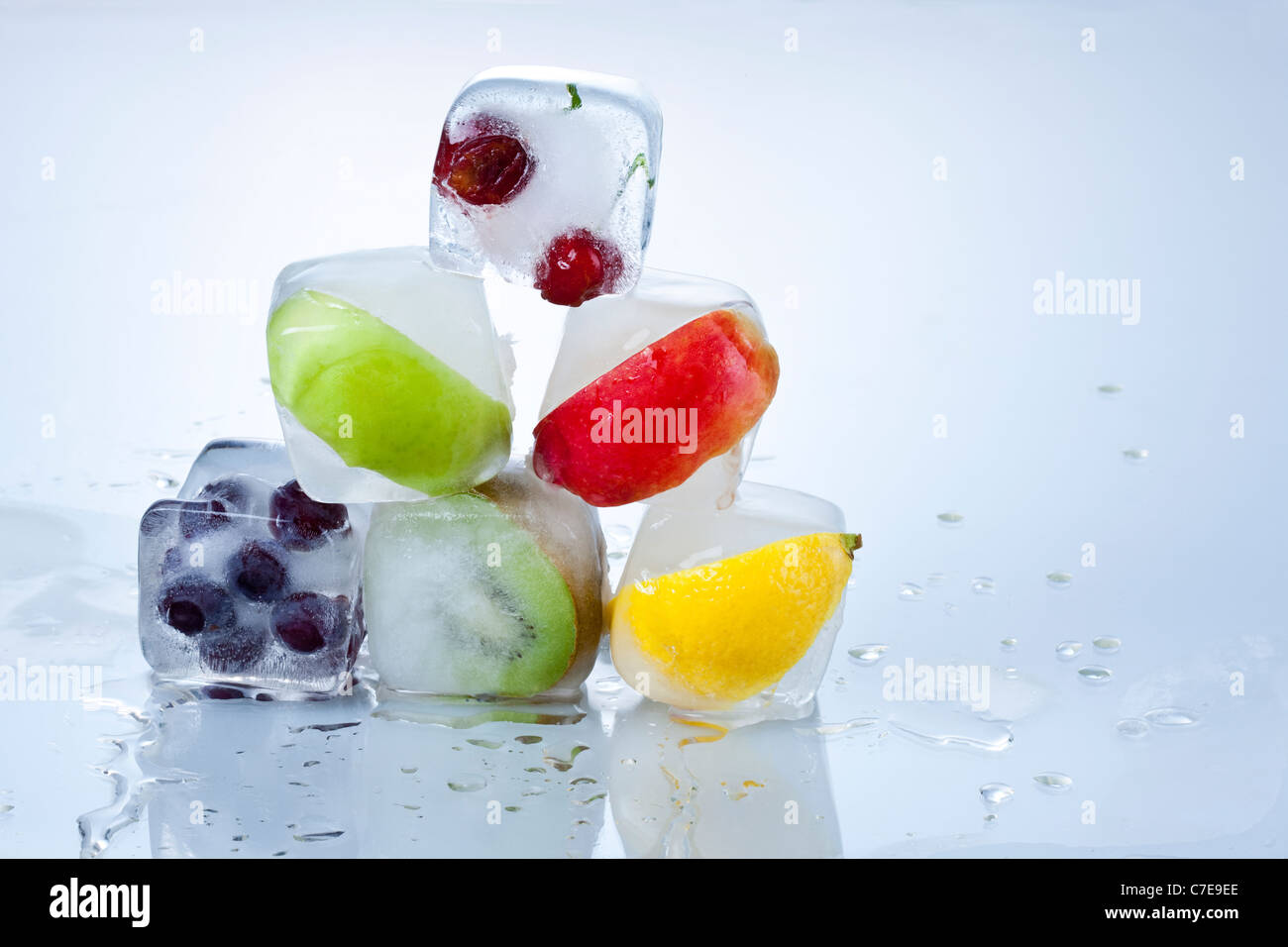 Frozen Fruit on White Background Stock Photo - Alamy