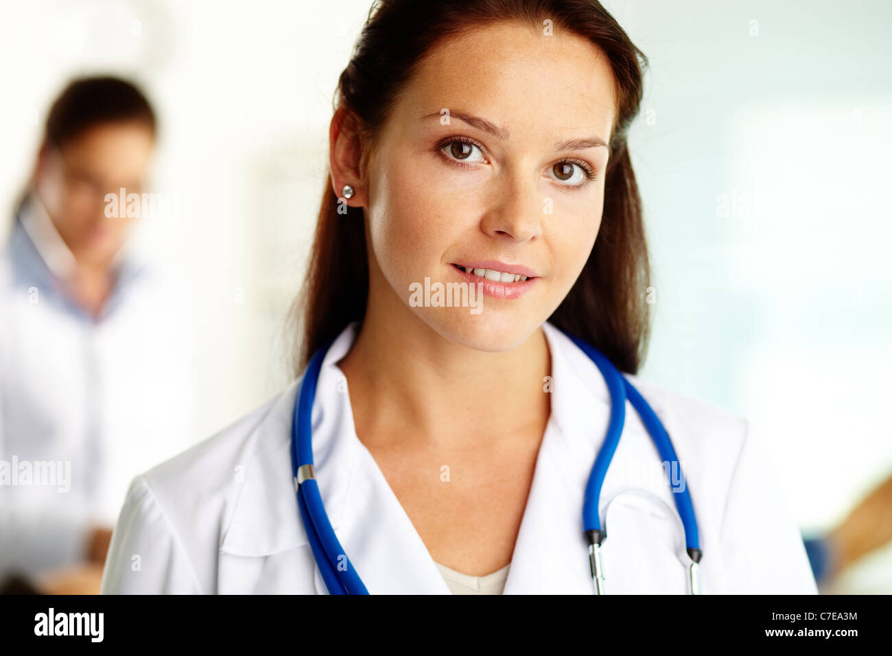 Portrait of confident female doctor looking at camera in hospital Stock ...