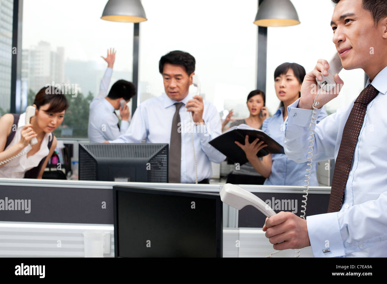 Busy Office Answering Phones Stock Photo - Alamy