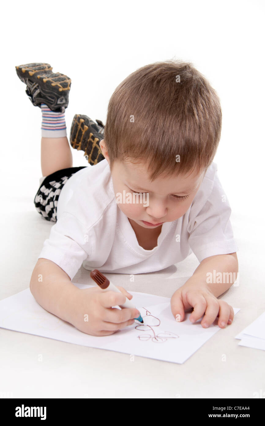 Cute little boy drawing Stock Photo - Alamy