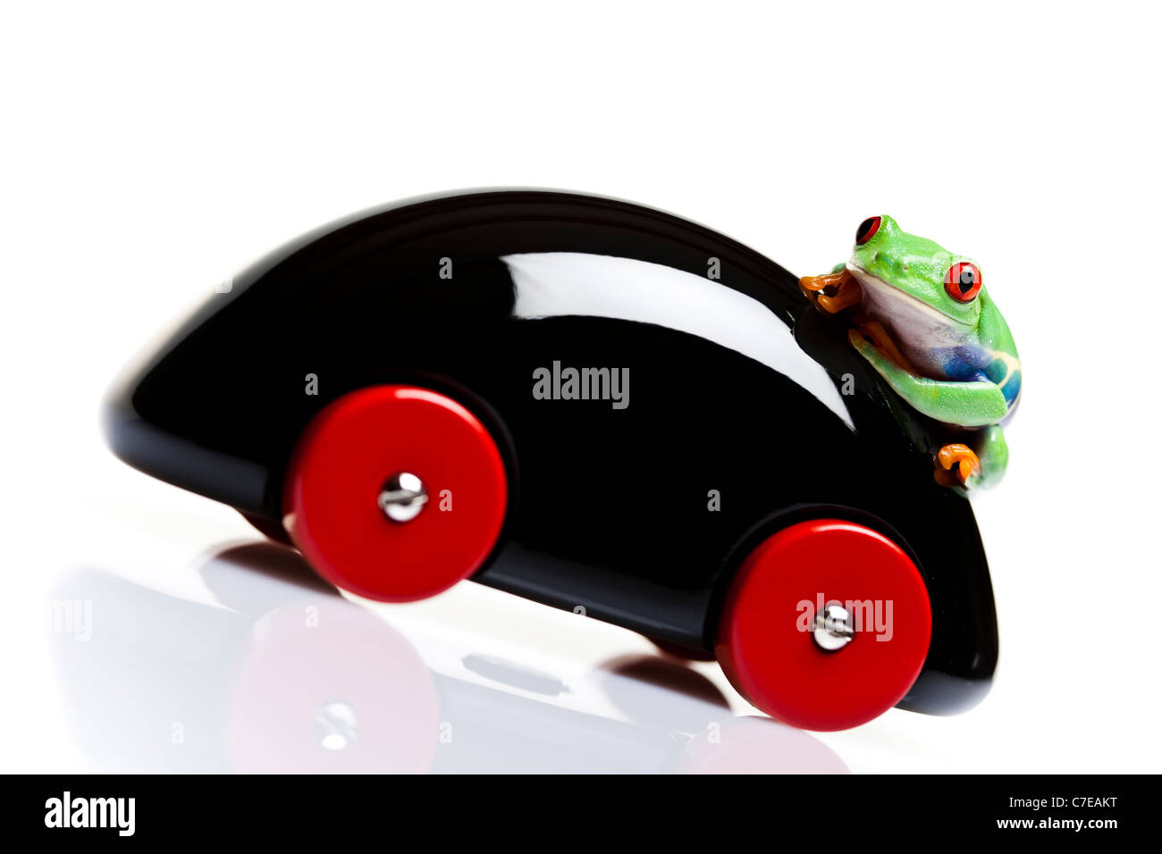 Frog and car Stock Photo - Alamy