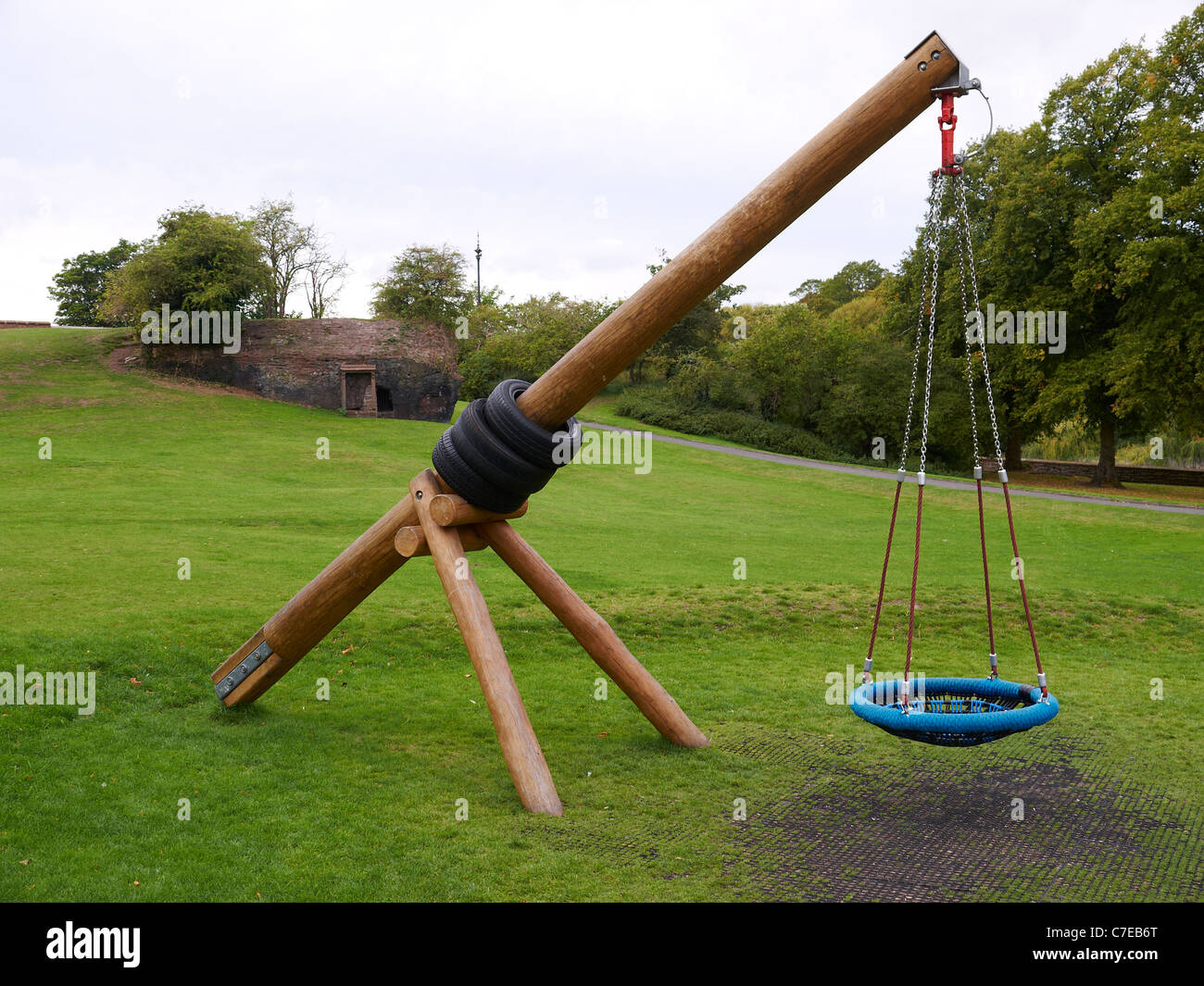 Modern swing in playground Stock Photo - Alamy