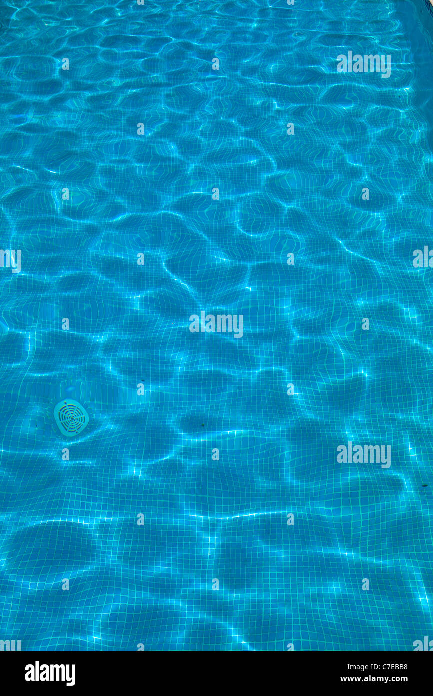 Sunlight reflecting off swimming pool Stock Photo - Alamy