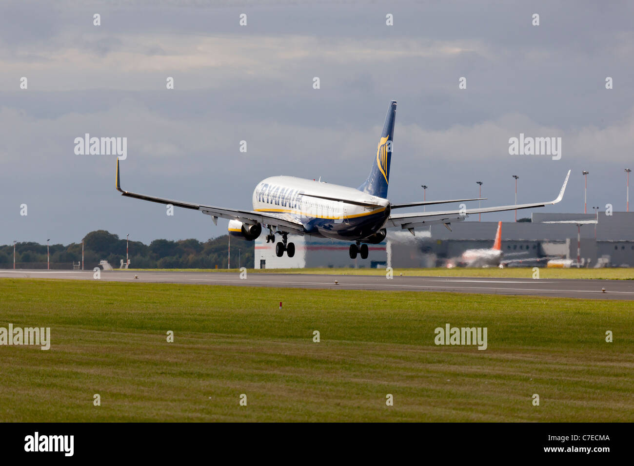 Ryanair jet landing at Liverpool John Lennon Airport Stock Photo - Alamy