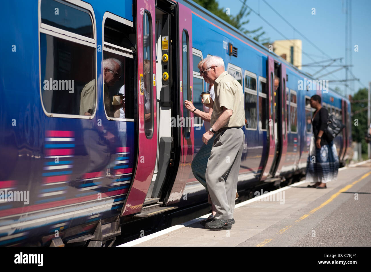 People boarding train hi-res stock photography and images - Alamy