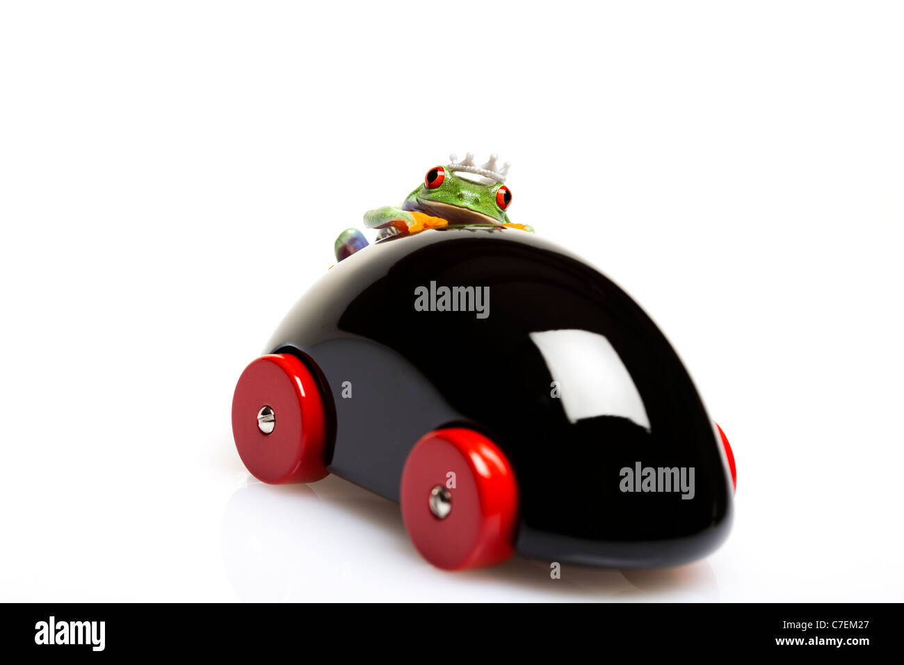 Frog and car Stock Photo - Alamy