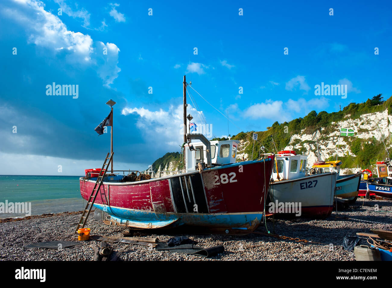 Fishing boats on beach at Beer Devon England Stock Photo - Alamy