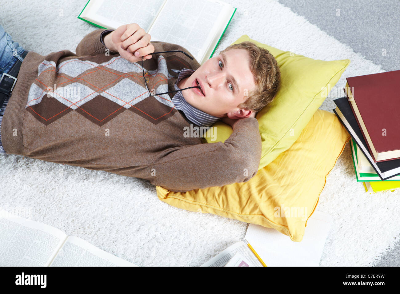 Young teenager doing homework textbook hi-res stock photography and ...