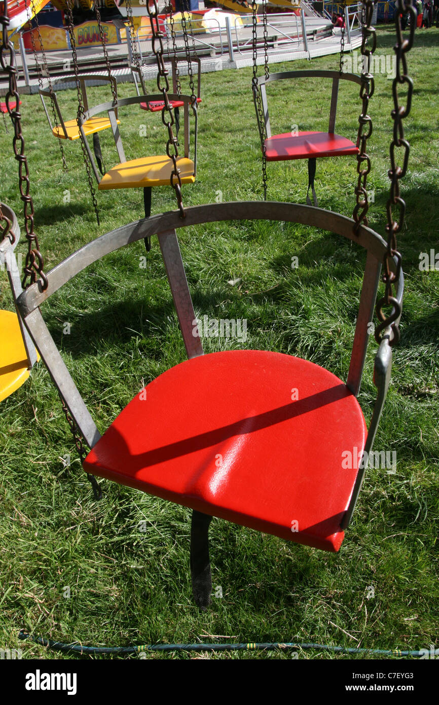 Merry go round ride in fairground Stock Photo - Alamy