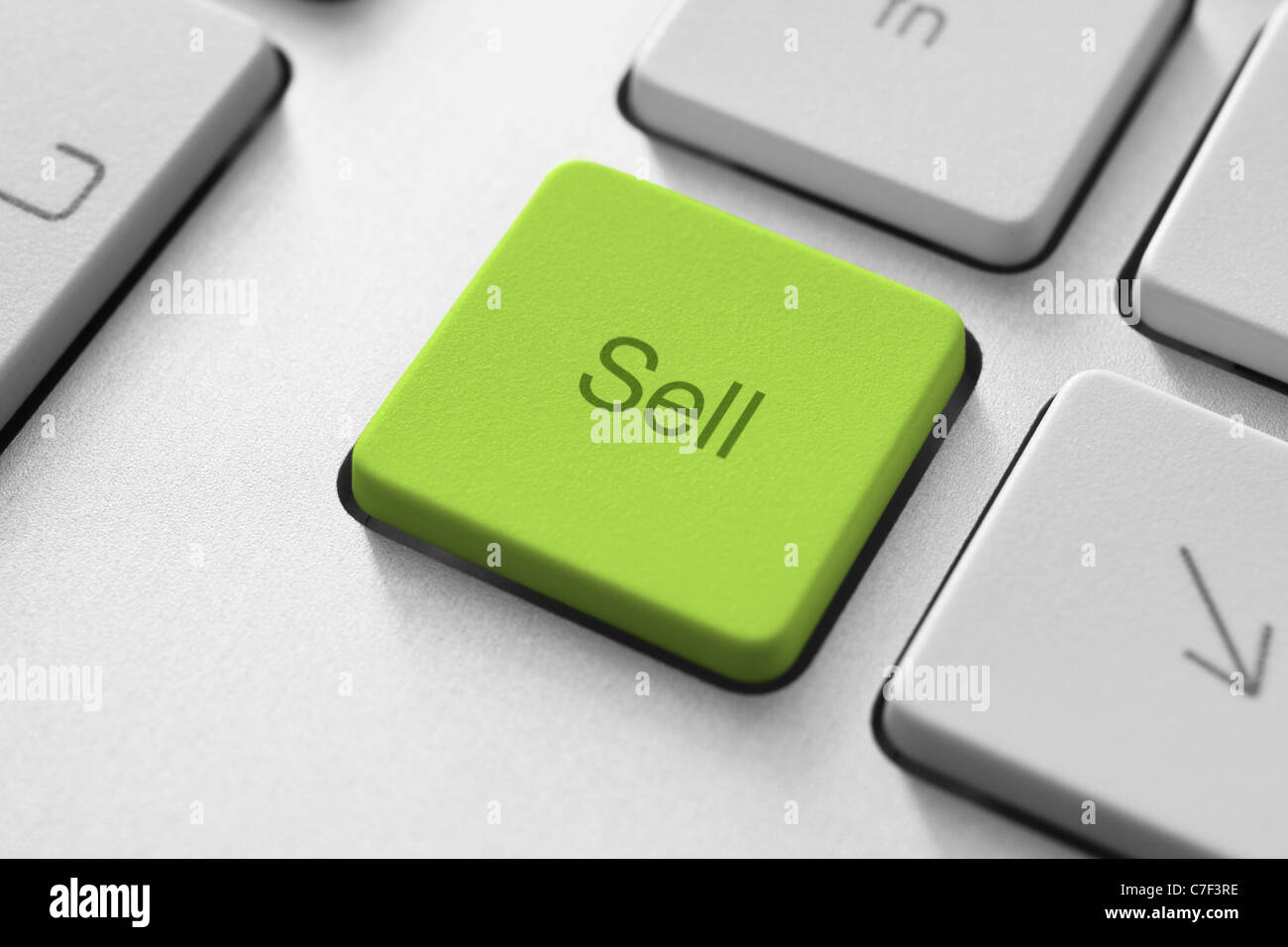 Sell button on the keyboard. Toned Image Stock Photo - Alamy