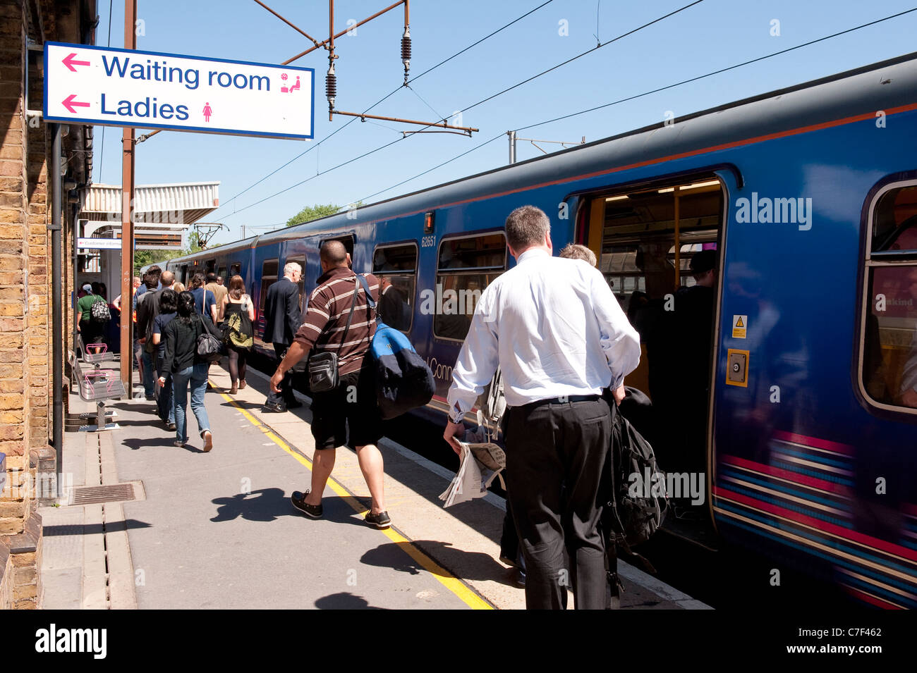 Passengers disembarking train hi-res stock photography and images - Alamy
