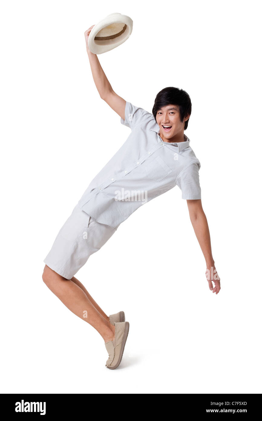 Young Man Standing on Tiptoes Stock Photo - Alamy