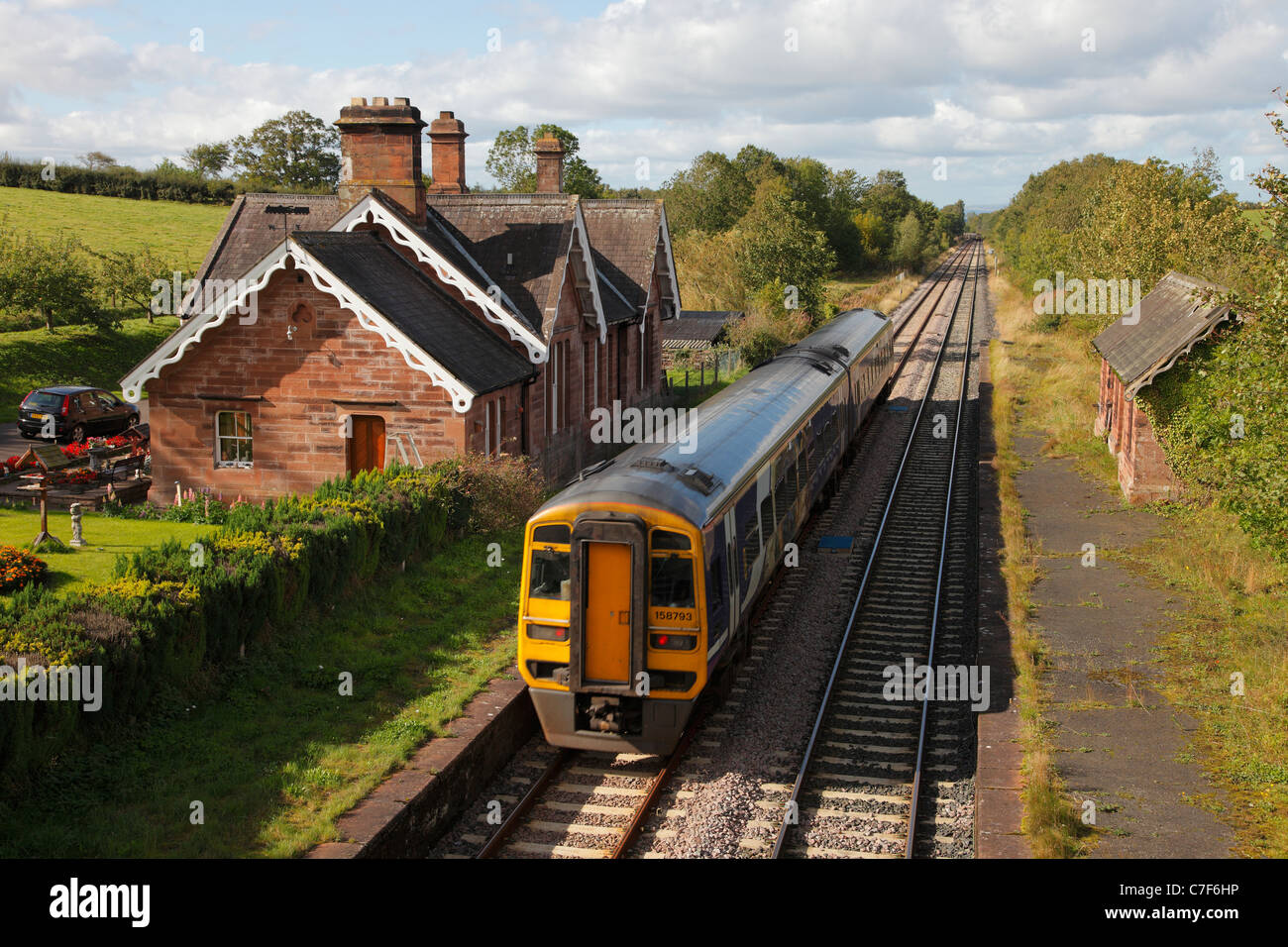 Sprinter train passing old Cumwinton Station on the Settle to Carlisle ...