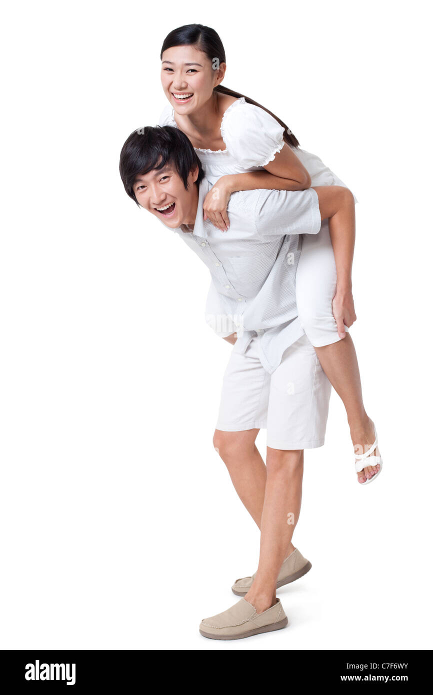 Man Carrying Woman on Back Stock Photo - Alamy