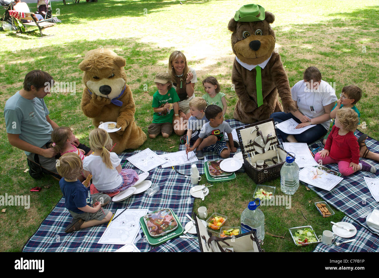 Yogi Bear, Boo Boo and wild life presenter Michaela Strachan having a ...