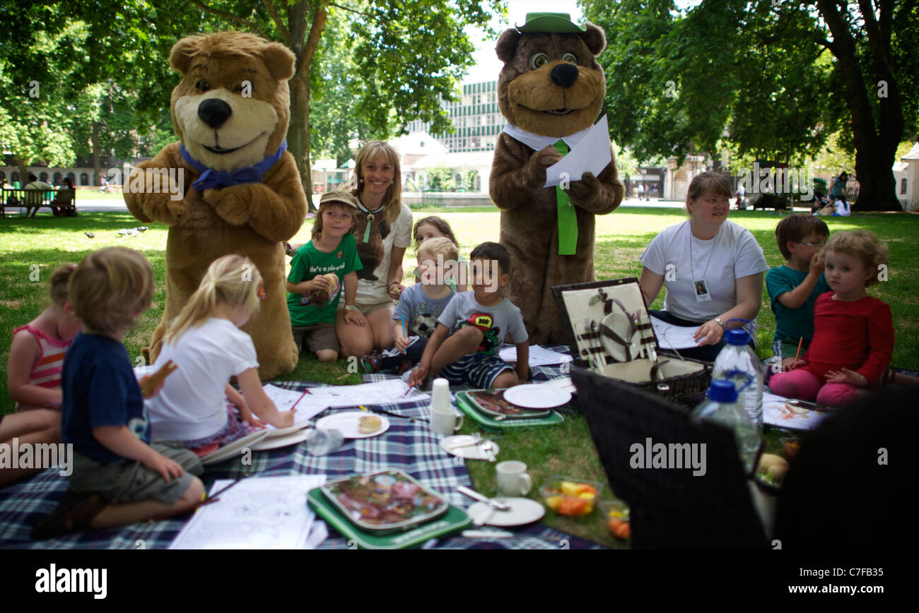 Yogi Bear, Boo Boo and wild life presenter Michaela Strachan having a ...