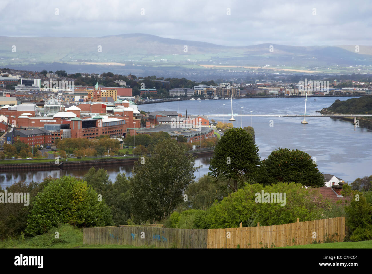 river foyle with new peace bridge in derry city county londonderry ...