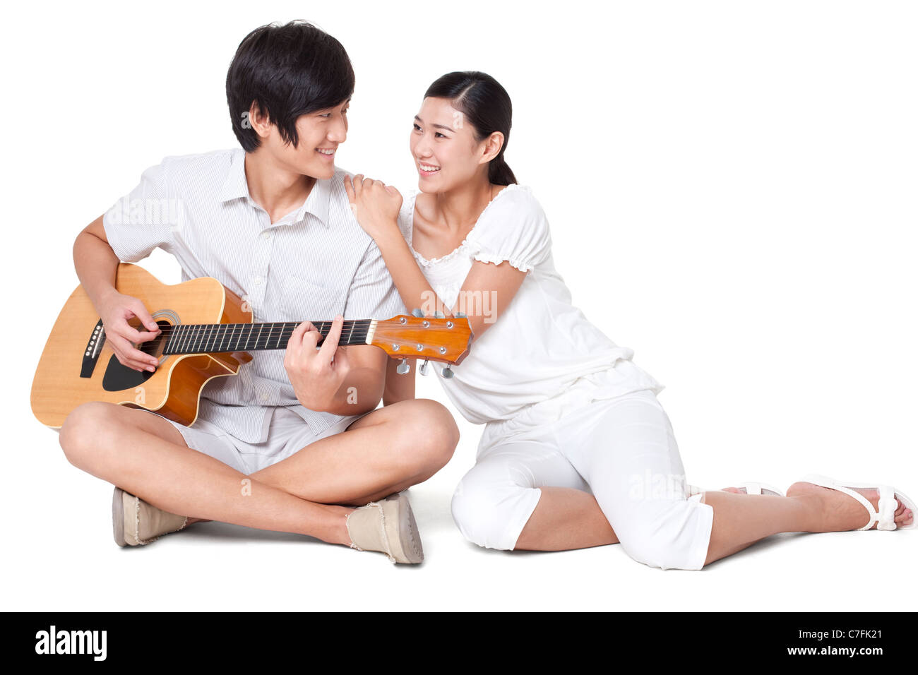 Man playing acoustic guitar string Cut Out Stock Images & Pictures - Alamy