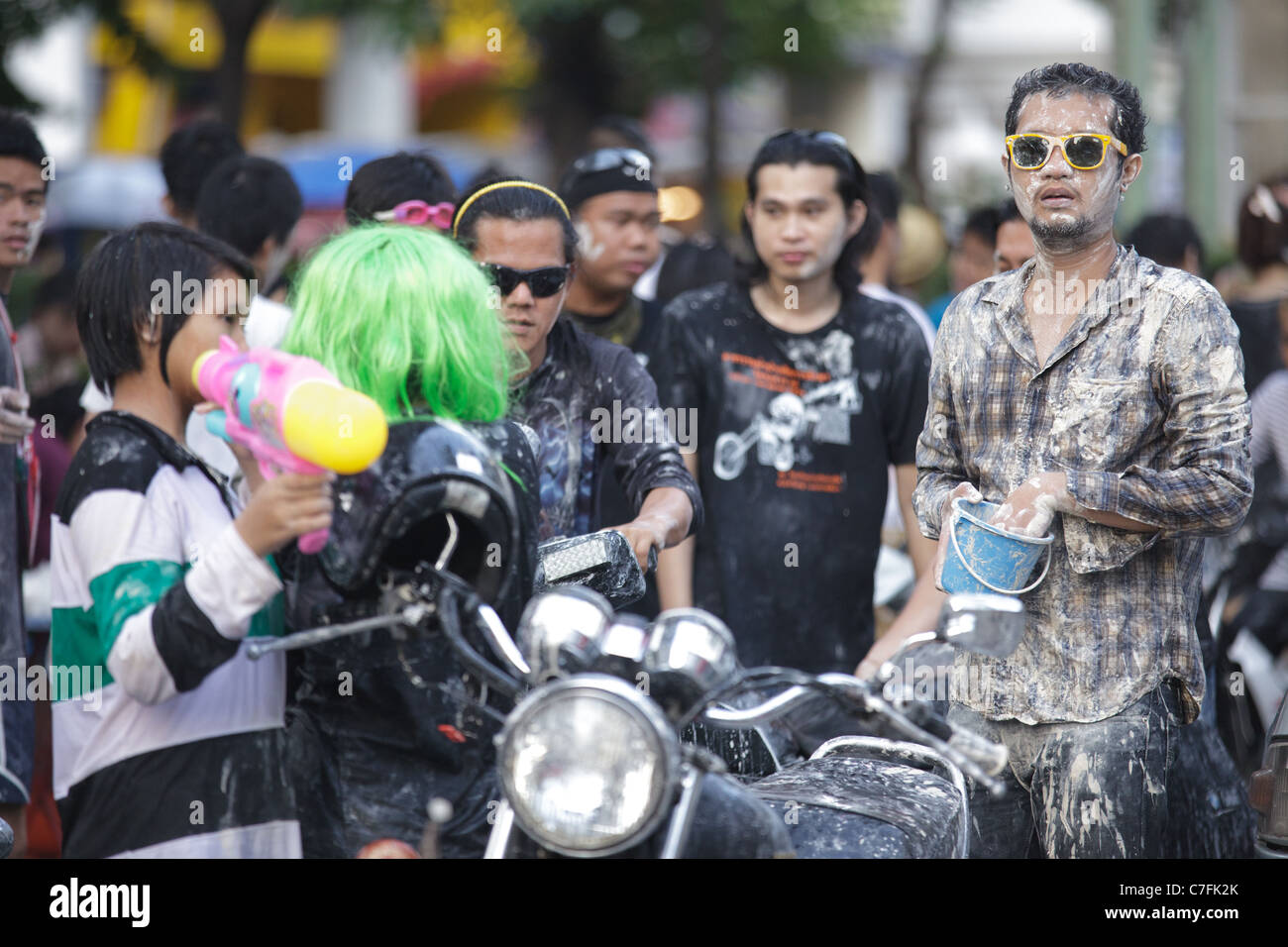 Thai people crowd celebrating song kran buddhist new year in silom road ...