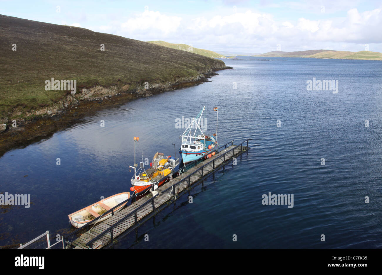 Boats at pier West Burra Shetland Islands Scotland September 2011 Stock ...