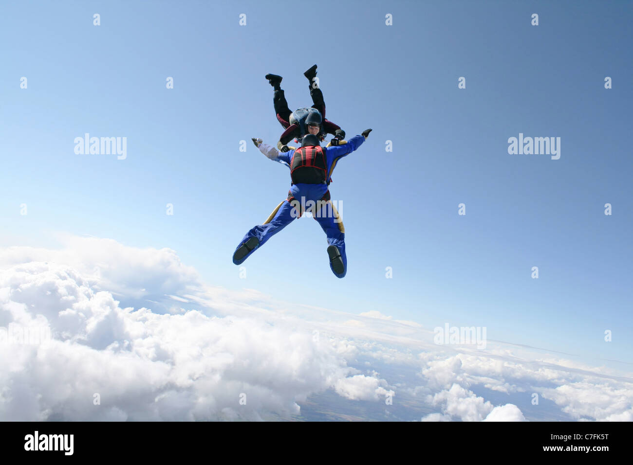 Two skydivers jump from an airplane Stock Photo - Alamy