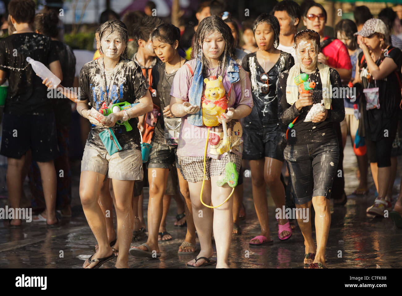 Thai people crowd celebrating song kran buddhist new year in silom road ...