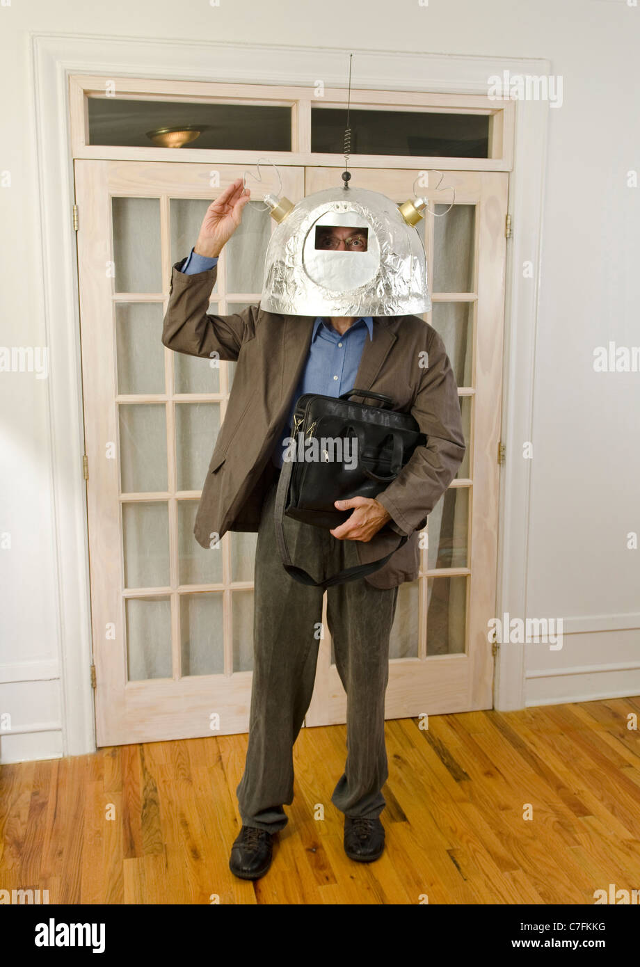 man adjusting antennas on helmet Stock Photo - Alamy