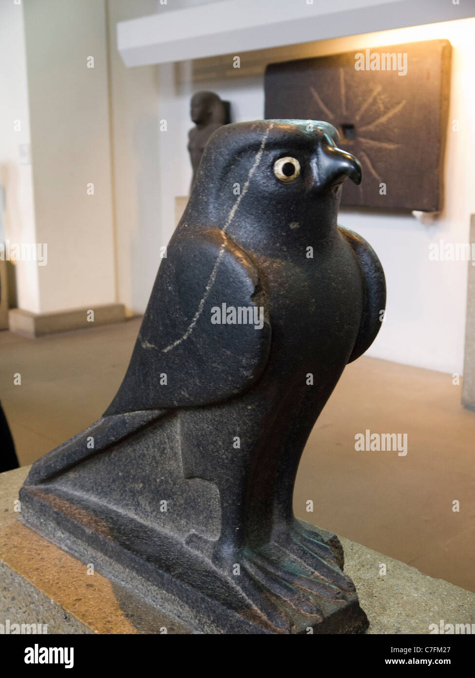 Statue of Hawk headed God Horus in the British Museum in London England ...