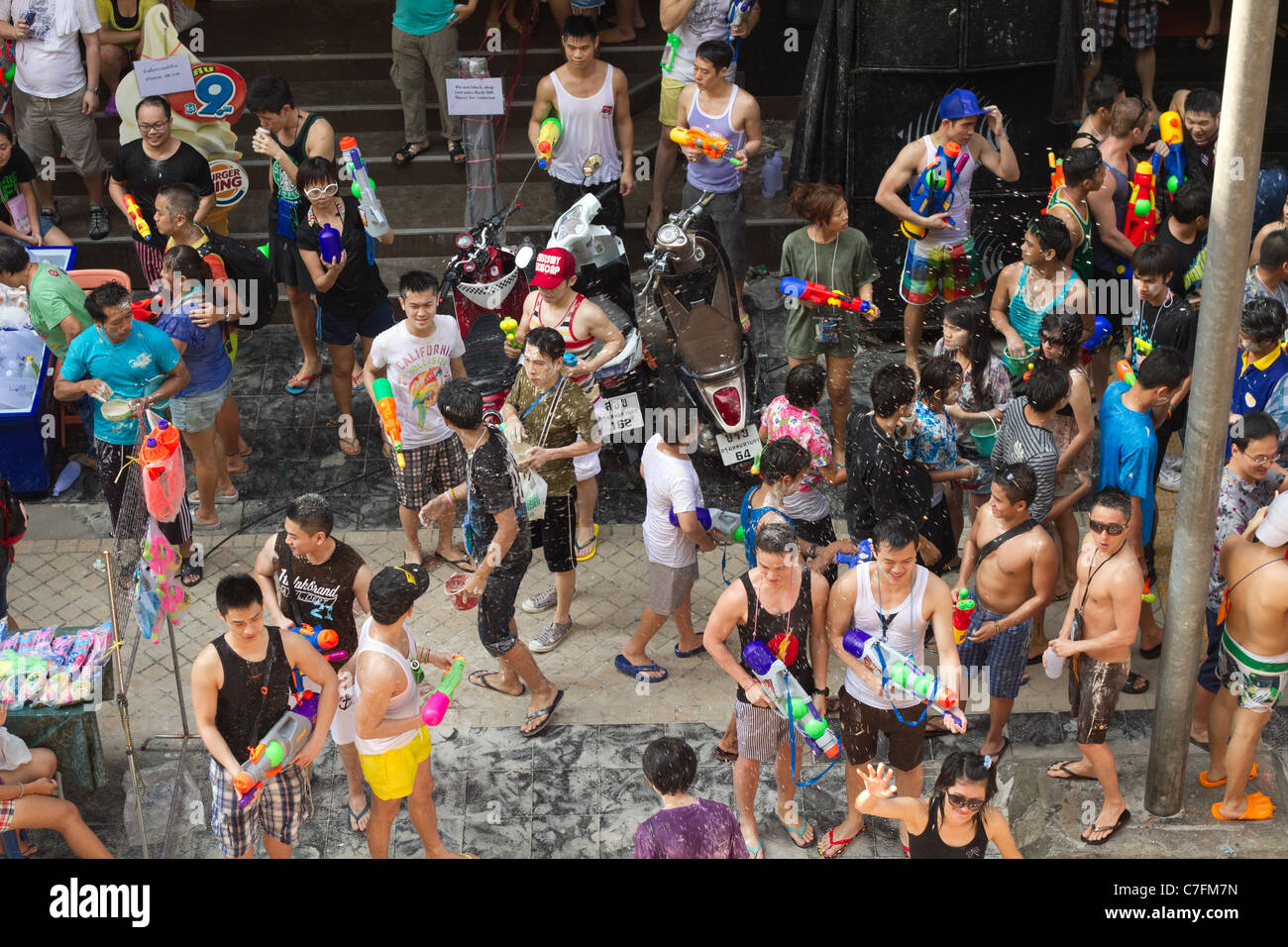 Thai people crowd celebrating song kran buddhist new year in silom road ...