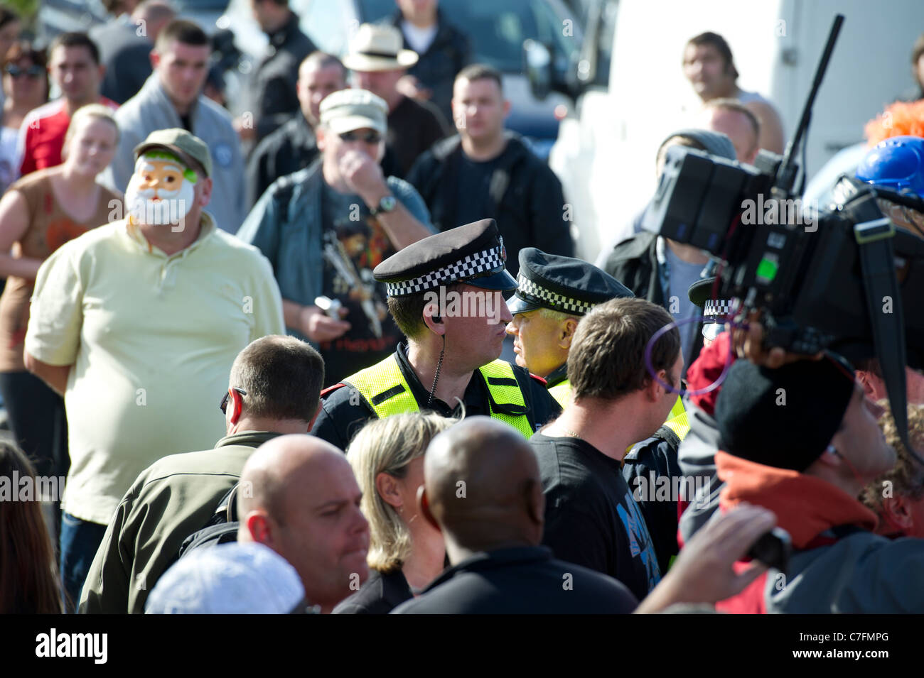 Dale Farm eviction. Police officers among the crowd outside the illegal ...