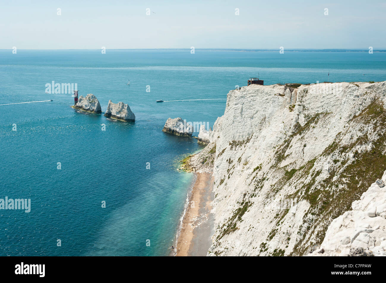 The Needles, lighthouse and chalk cliffs, Isle of Wight, UK Stock Photo ...