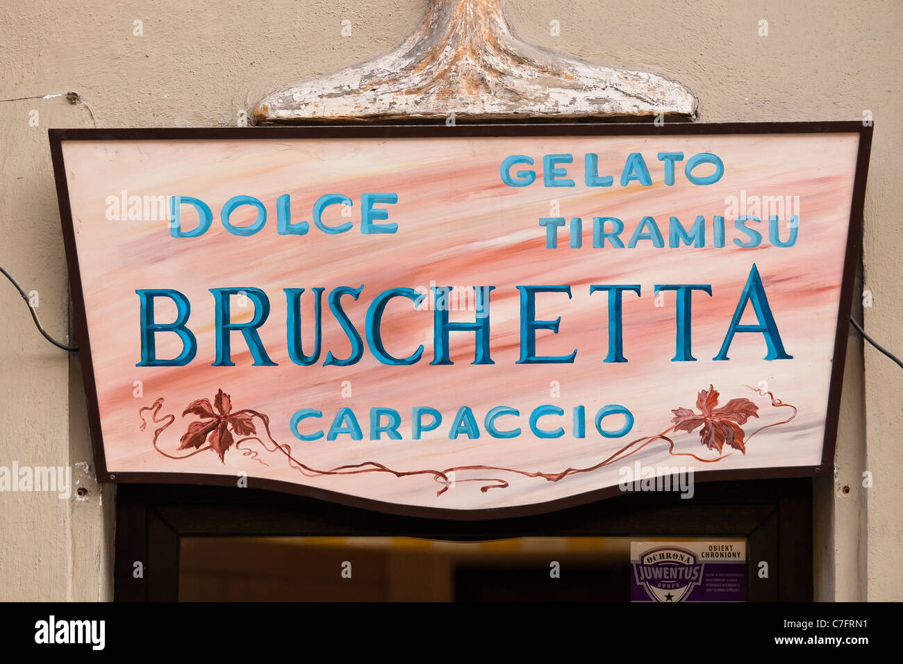 Old fashioned signboard of italian style restaurant. Krakow, Poland ...