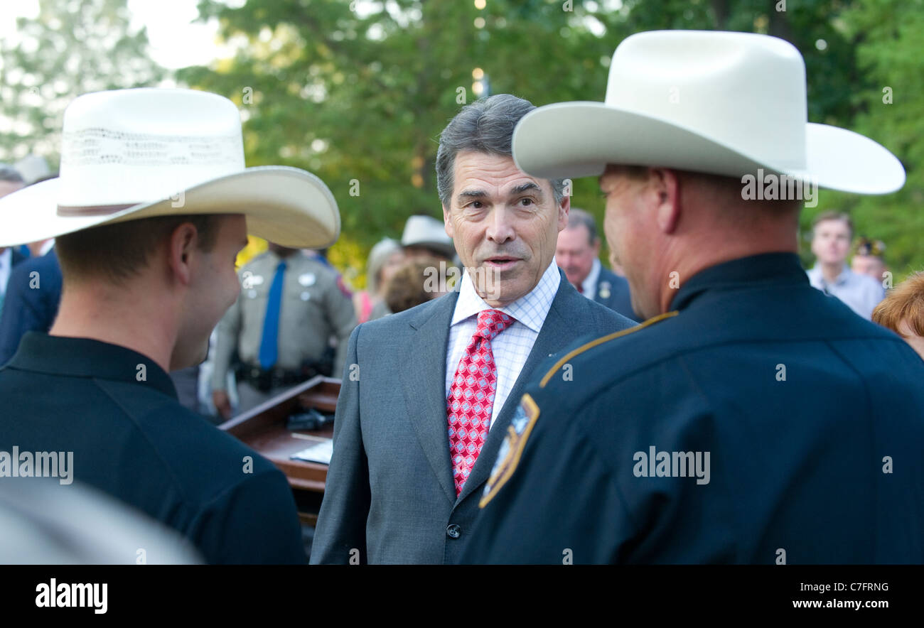 Texas Gov. Rick Perry with uniformed state troopers in Austin during ...