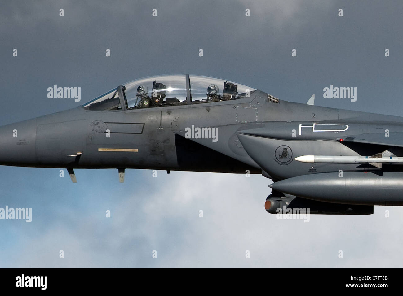 USAF F-15E Strike Eagle makes a turn during a low flying flight in mid ...
