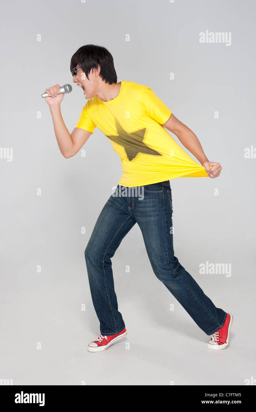 Singing passionately hi-res stock photography and images - Alamy